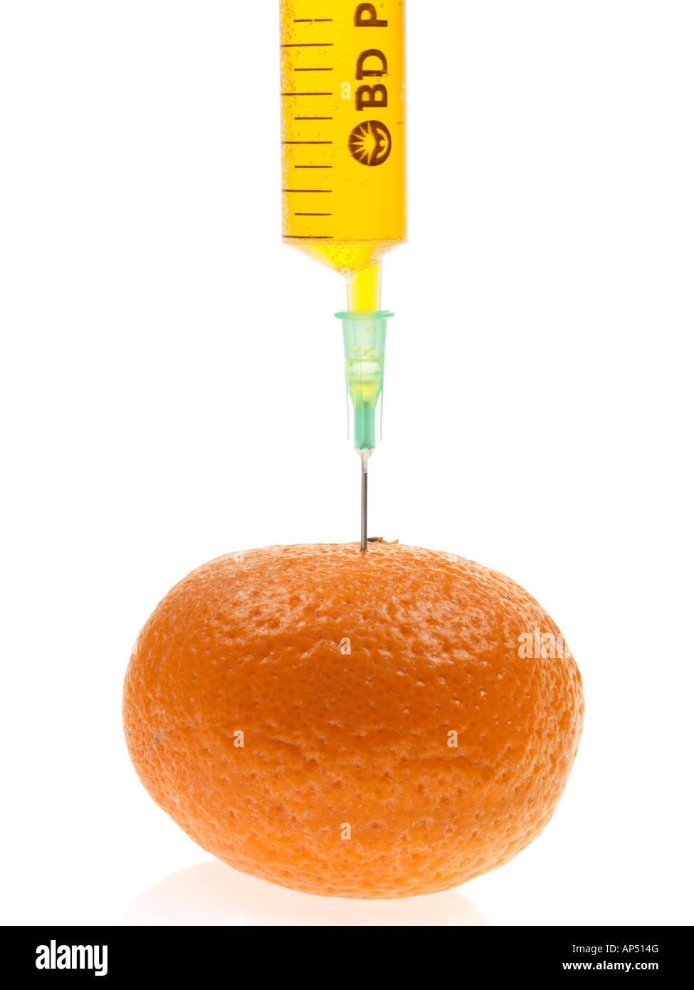 Syringe injecting orange fruit hi-res stock photography and images - Alamy