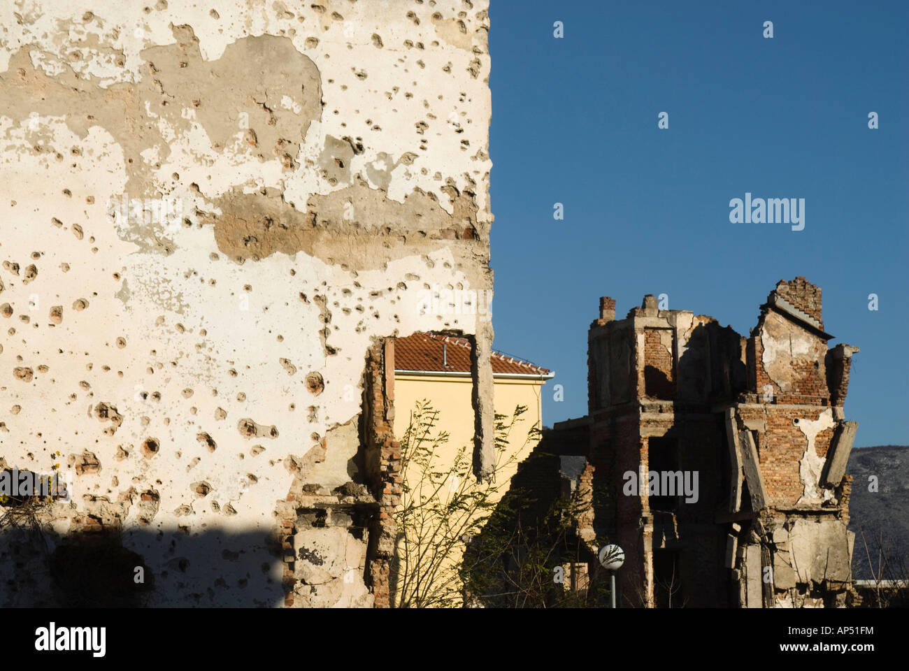 Pockmarked and bomb damaged buildings in Mostar, Bosnia & Herzegovina ...