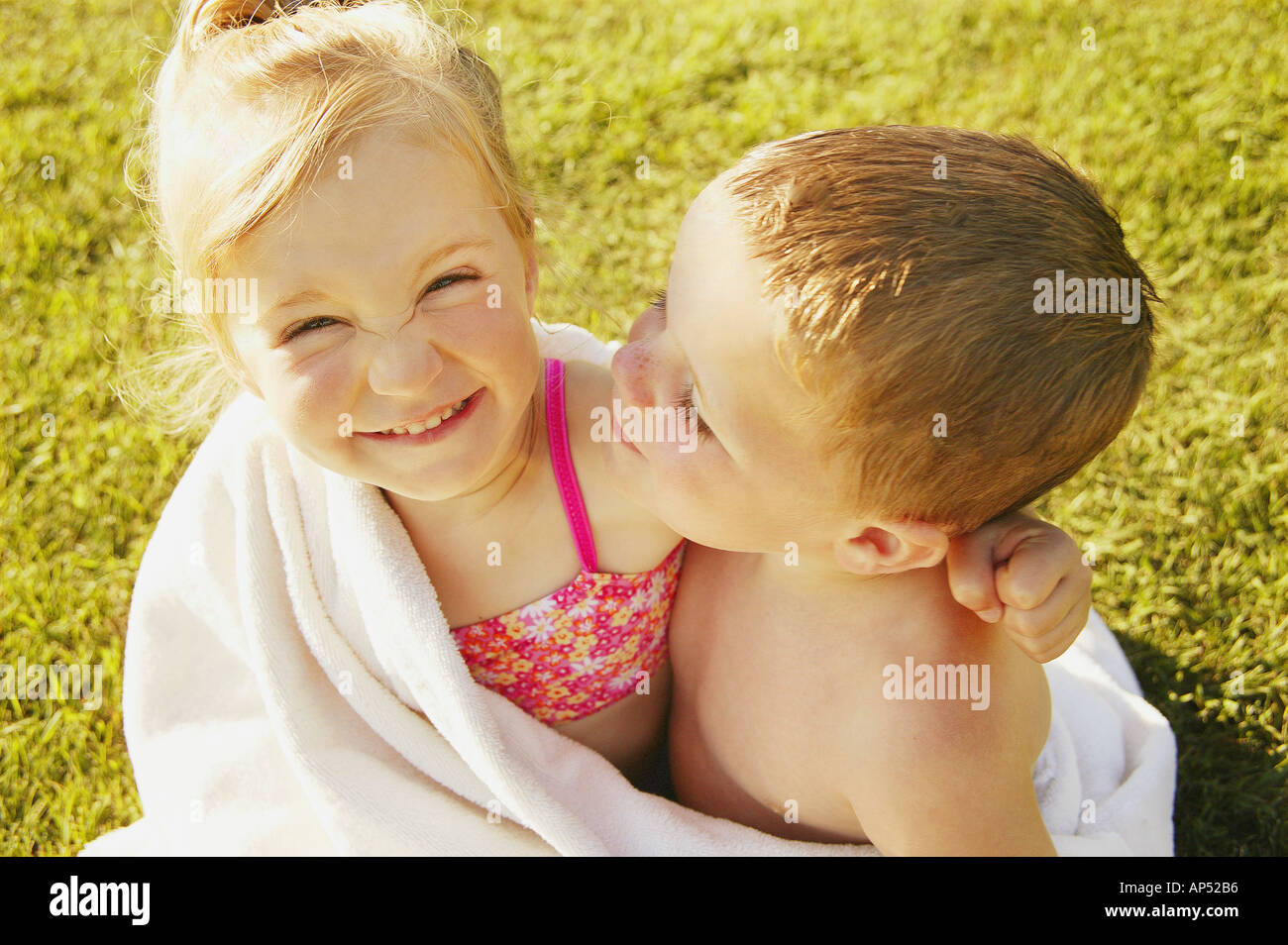 Boy And Girl Share A Towel Stock Photo Alamy