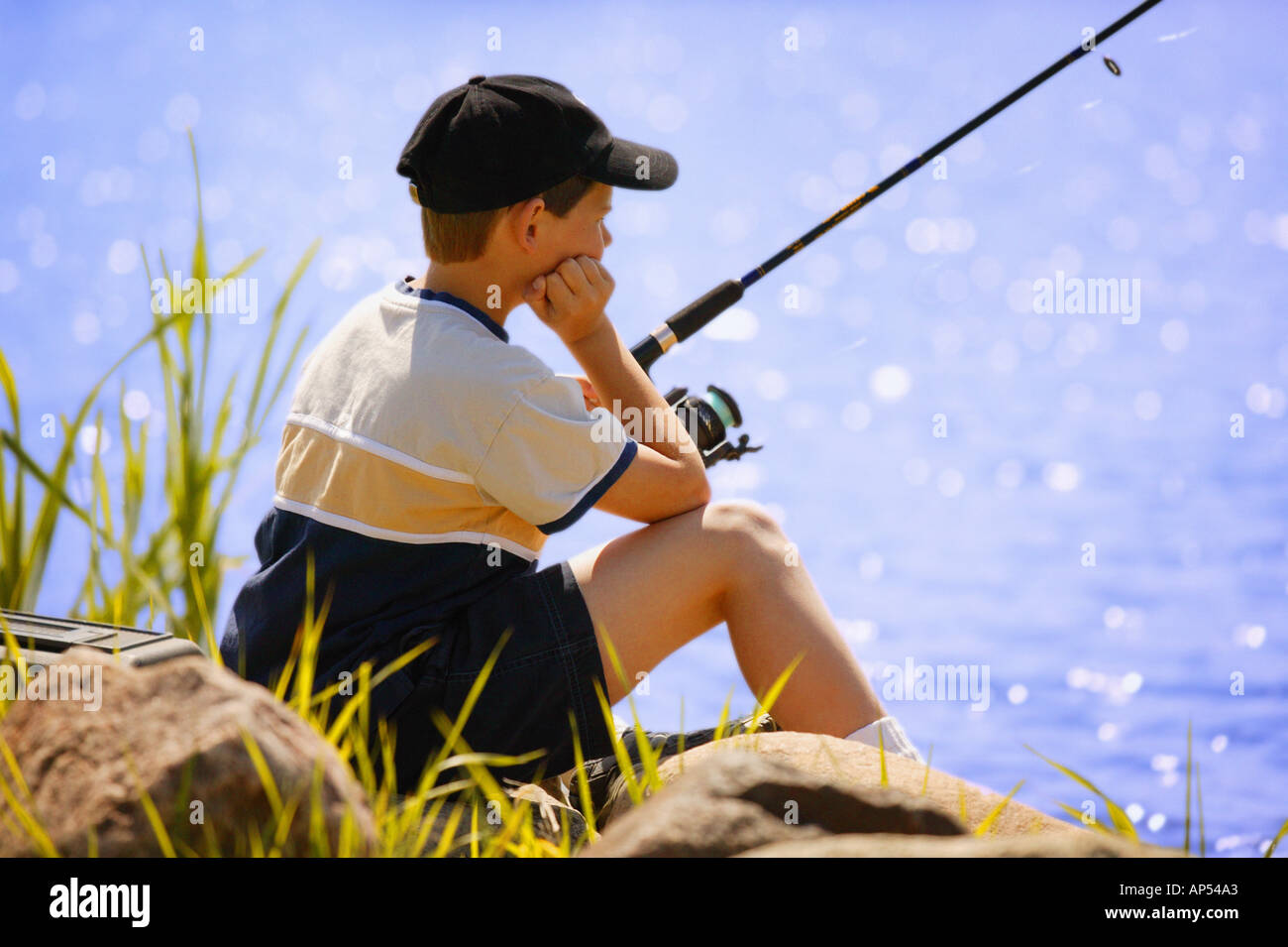 Children with fishing poles hi-res stock photography and images - Alamy