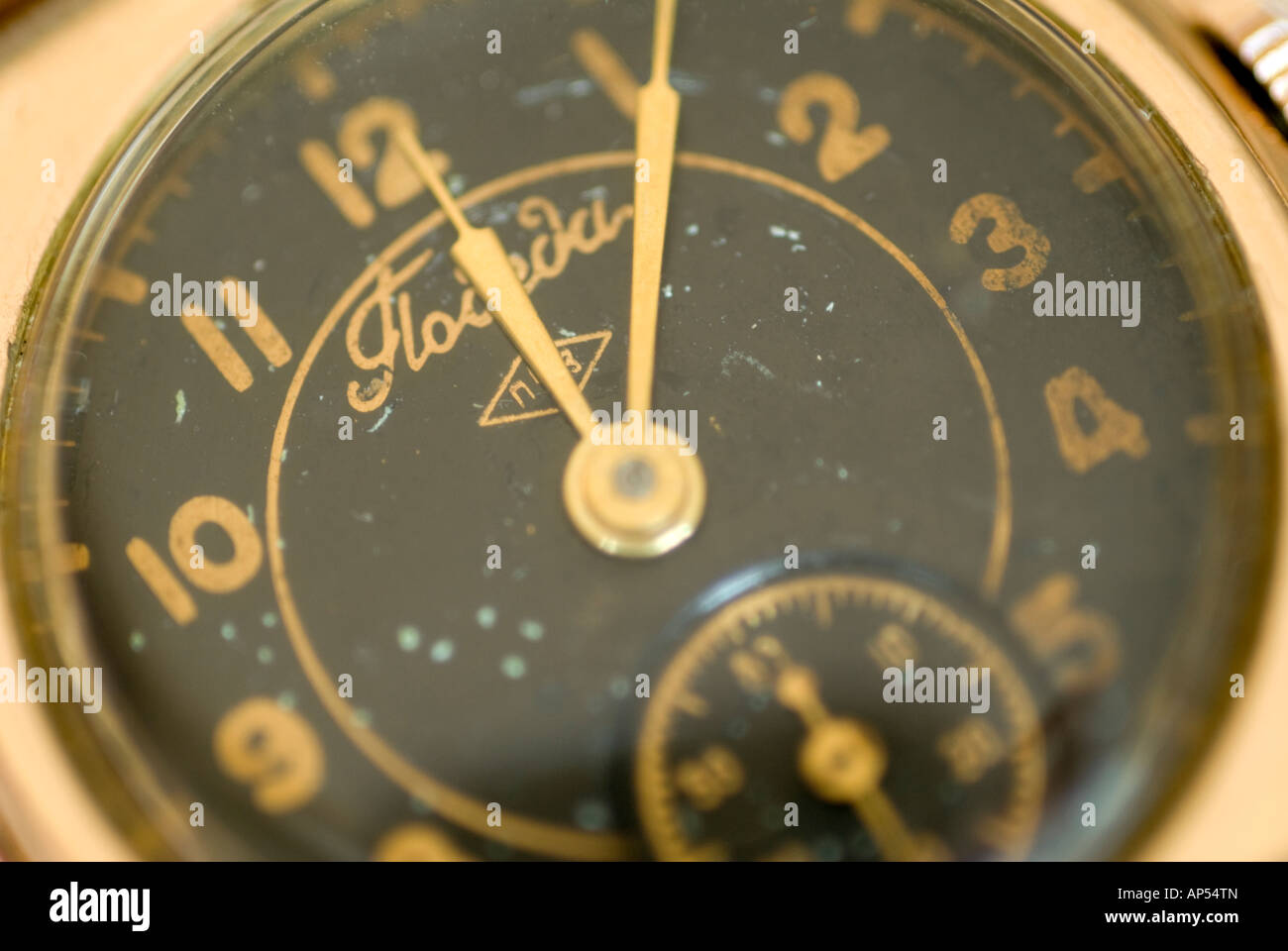 old fashioned golden watch Stock Photo - Alamy