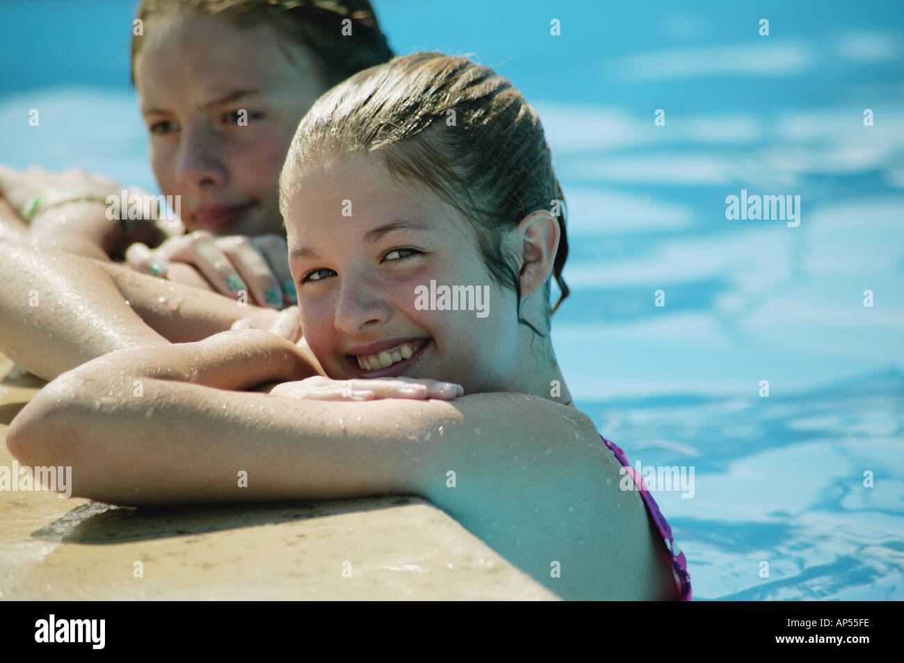 Families playing in swimming pool hi-res stock photography and images ...