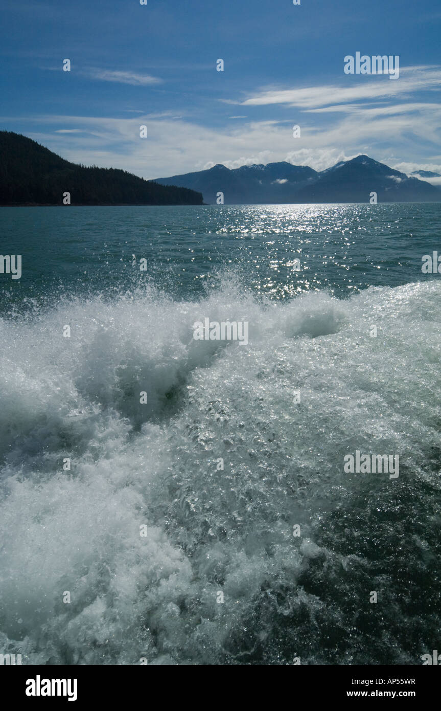 Boat wake, mountains and sun, Alaska USA Stock Photo - Alamy