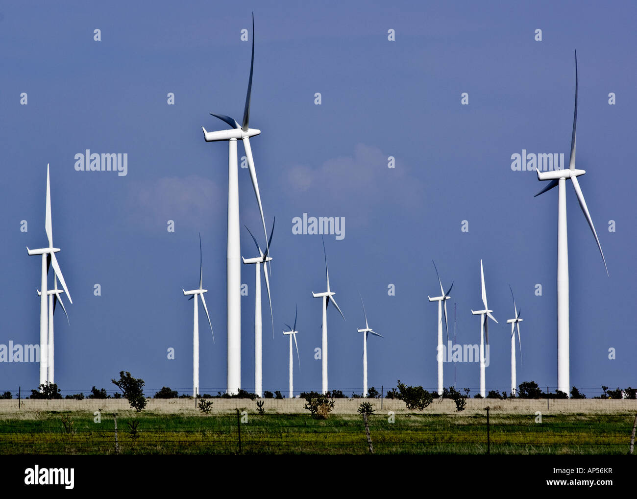 Wind powered turbines on Texas wind farm under a deep blue sky Stock ...
