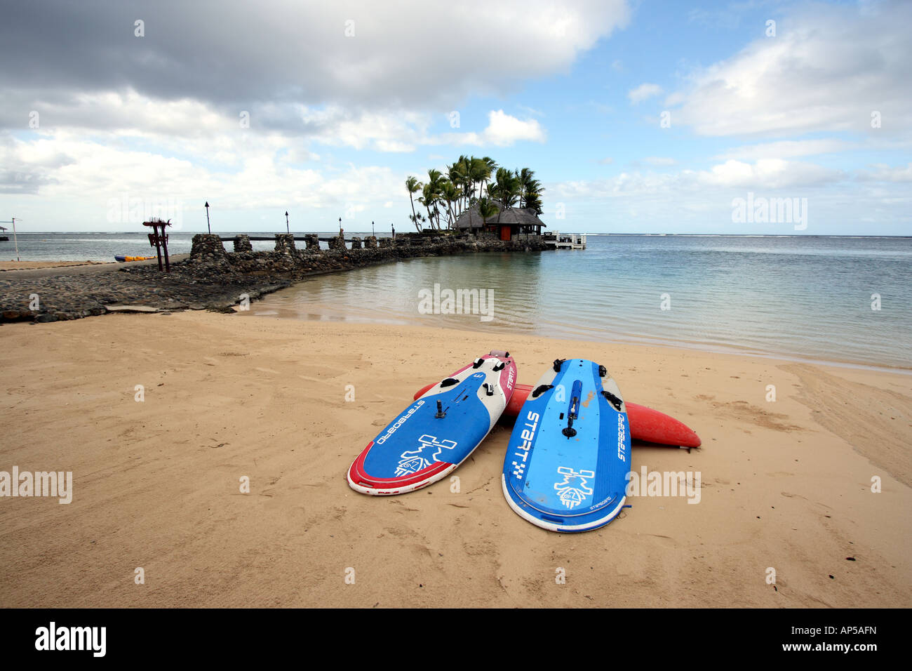 WIDE VIEW OF WINDSURFERS ON A BEACH FIJIAN ISLAND RESORT HORIZONTAL ...