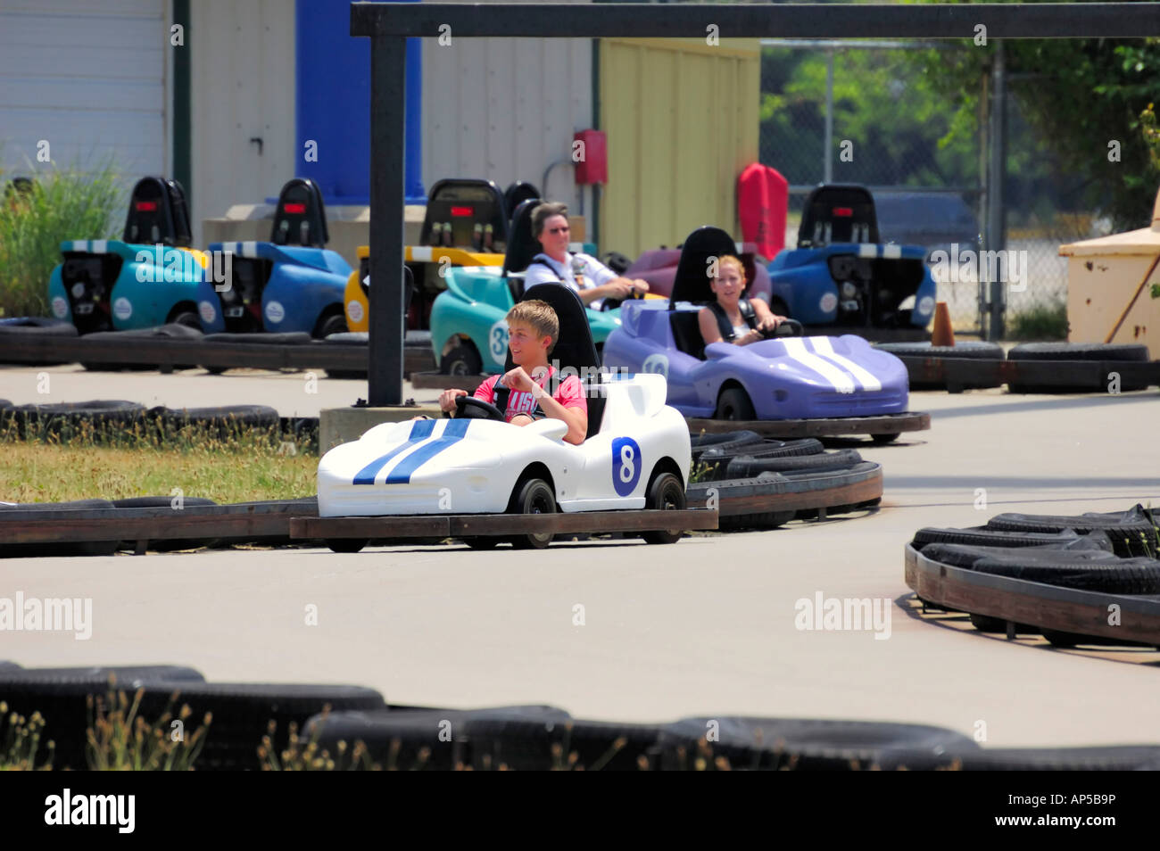 Thrill Carts racing around a track at the Six Flags Kentucky Kingdom ...