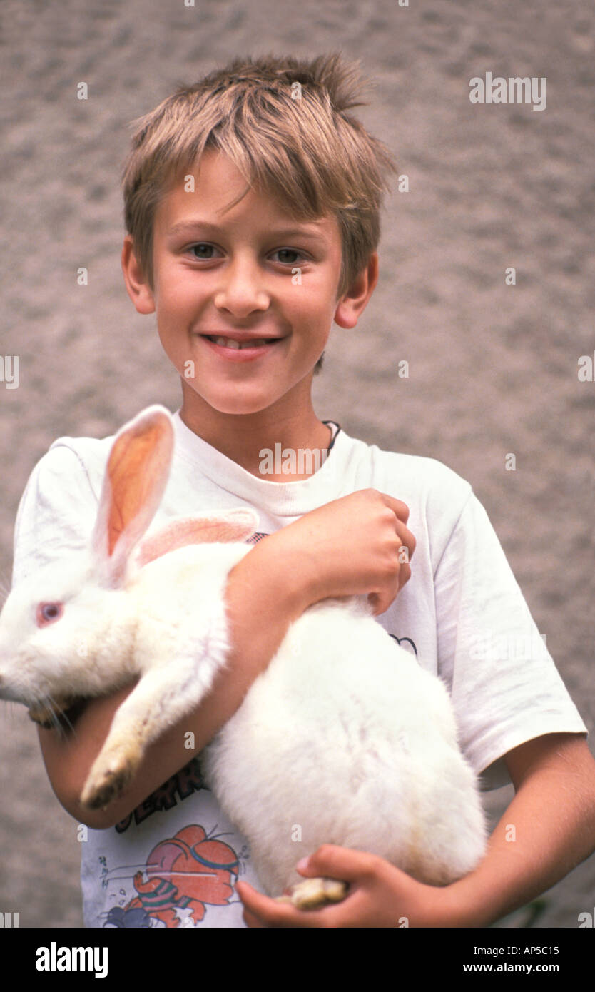 BOY WITH A RABBIT Stock Photo - Alamy