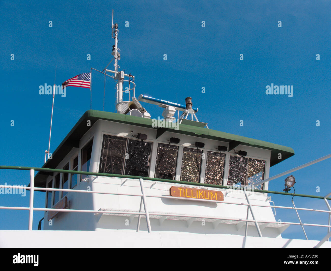 Reflections from sunlight on water in wheelhouse windows of Washington ...