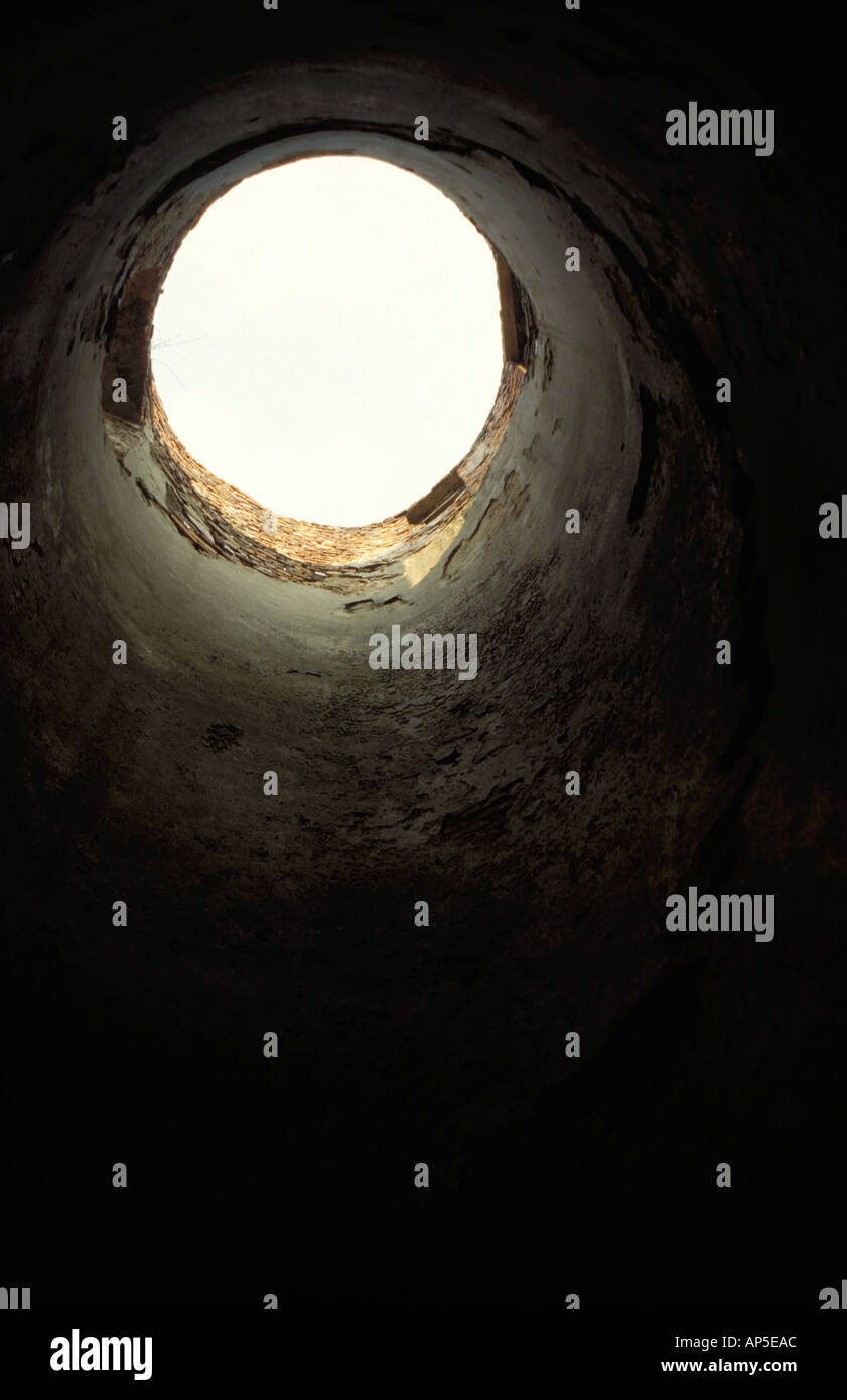 Inside a tower or a well, looking upwards Stock Photo - Alamy