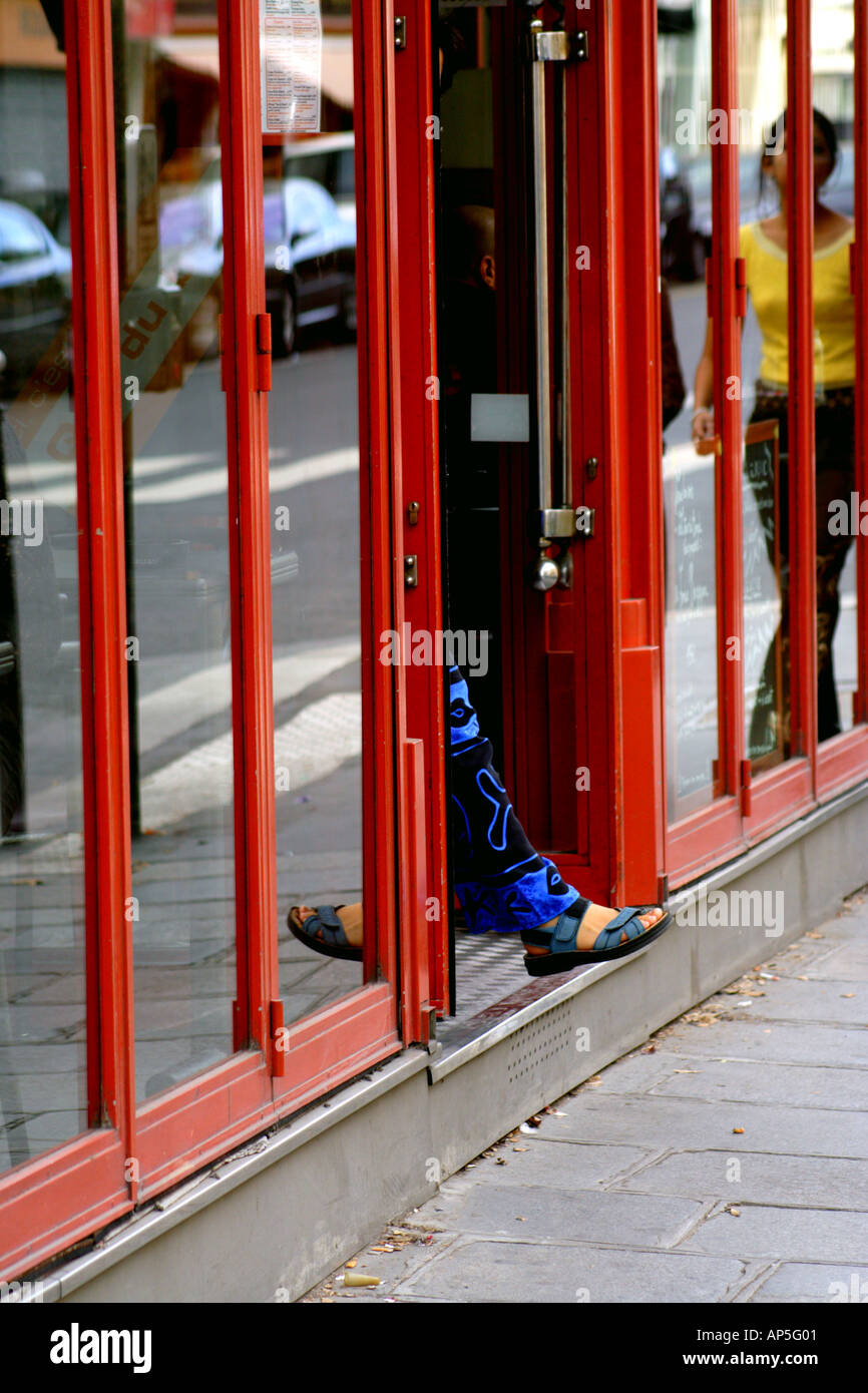 Girl steps out of the restaurant Stock Photo - Alamy