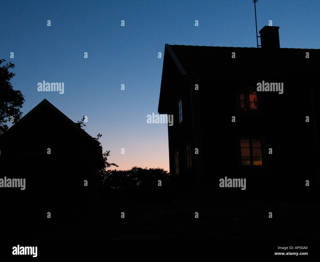 Wooden house at night Stock Photo - Alamy