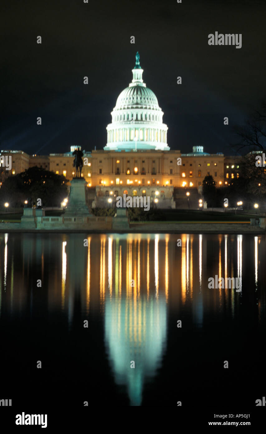 The US Capitol Building reflected in the reflecting pool in Washington ...