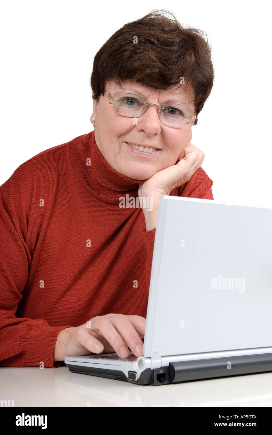 Senior woman in front of a computer Studio picture Full isolated Stock ...