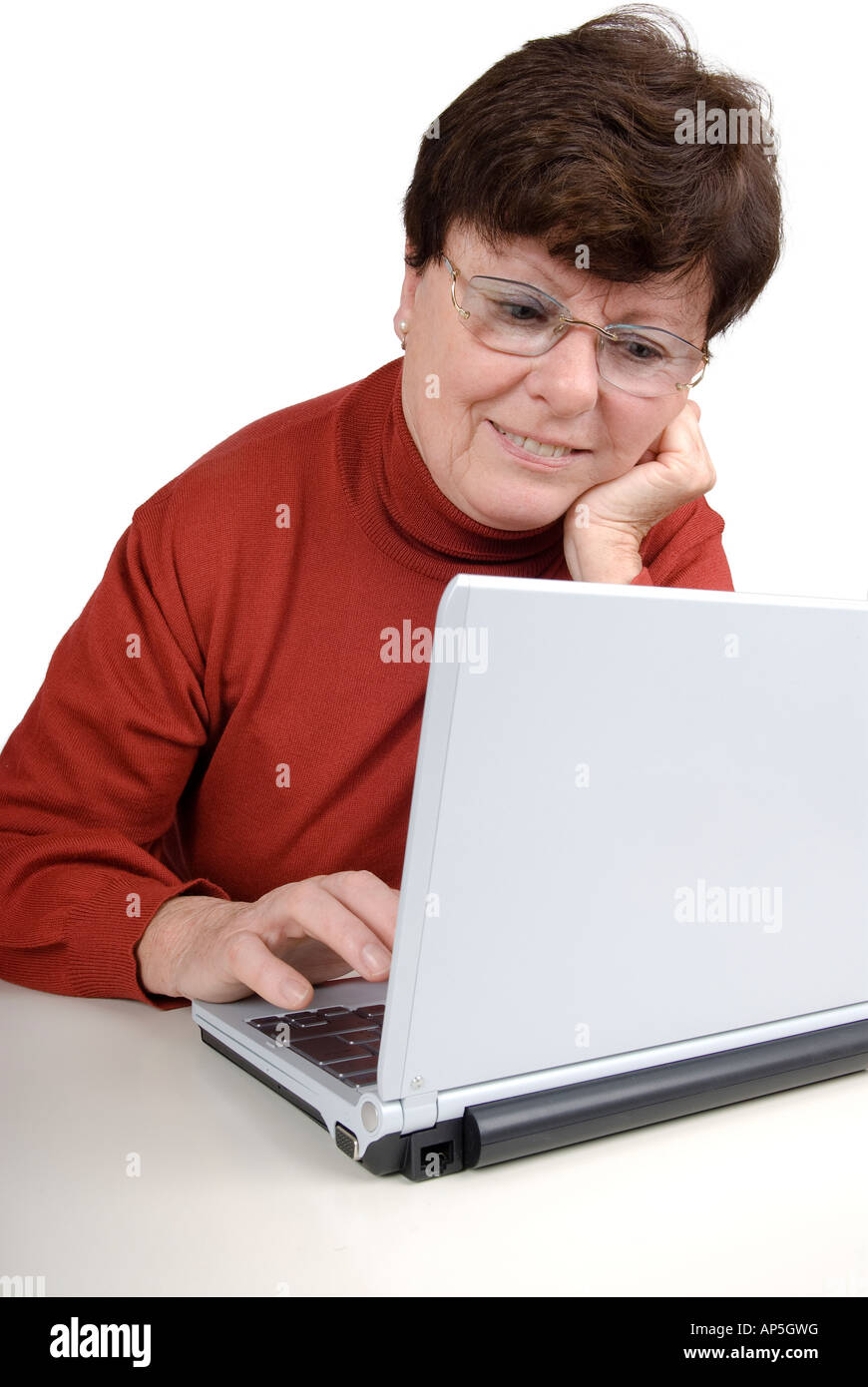 Senior woman in front of a computer Studio picture Full isolated Stock ...