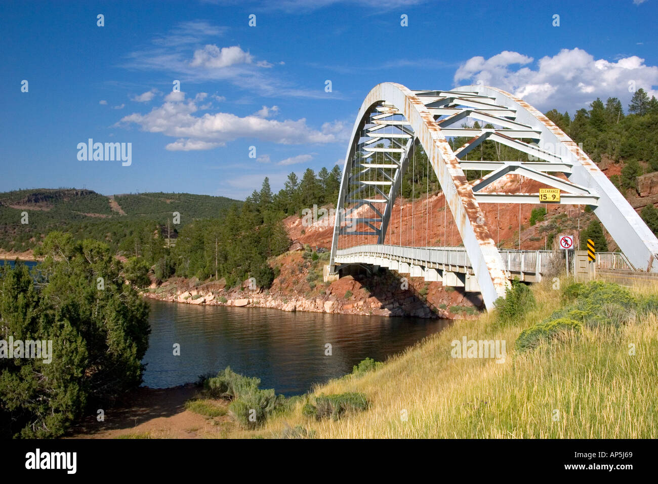 Arched iron suspension bridge along highway 191 at Flaming Gorge ...