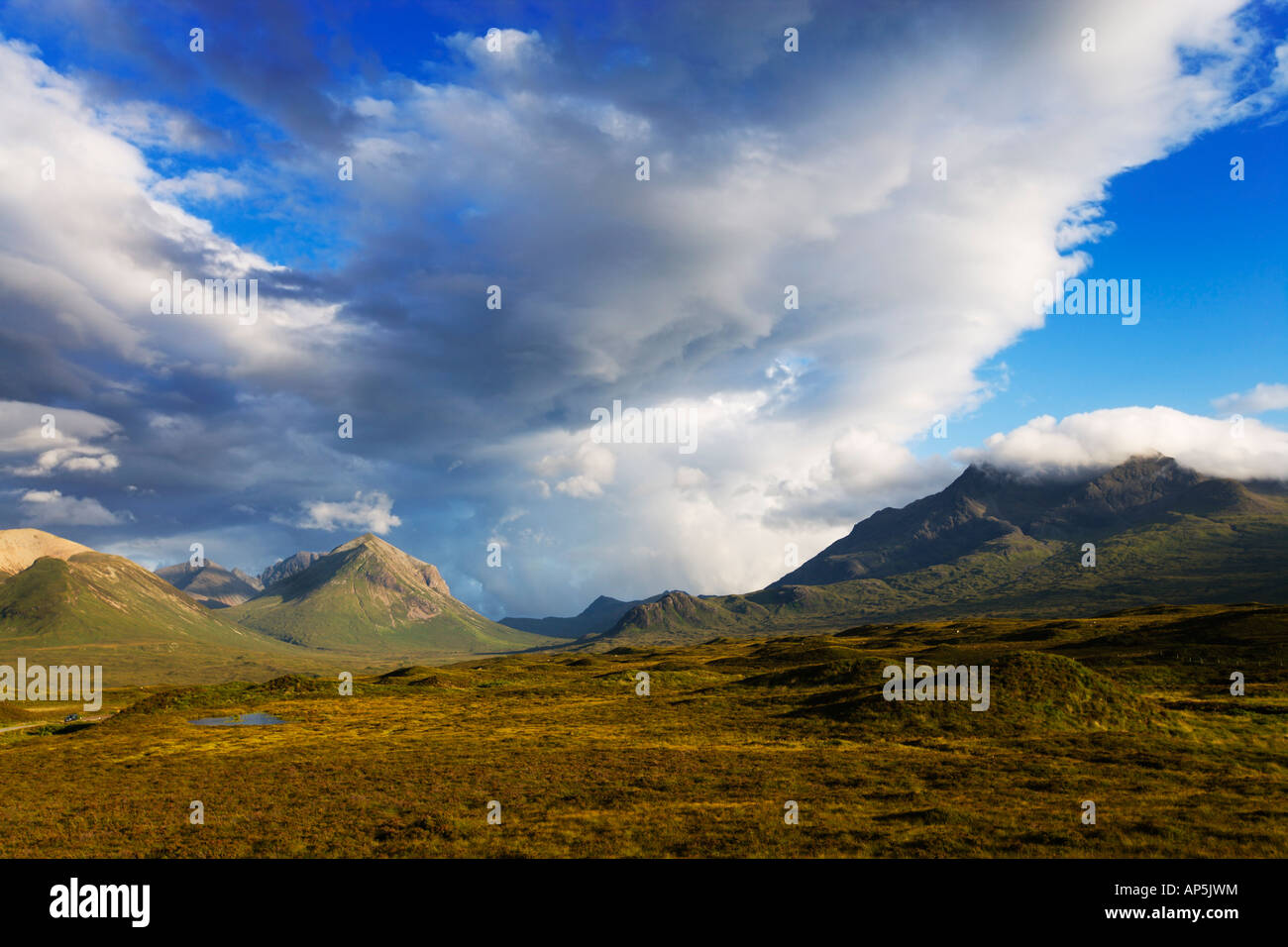 Windswept Clouds Pass High Over The Peaks Of The Red Cuillin Hills ...