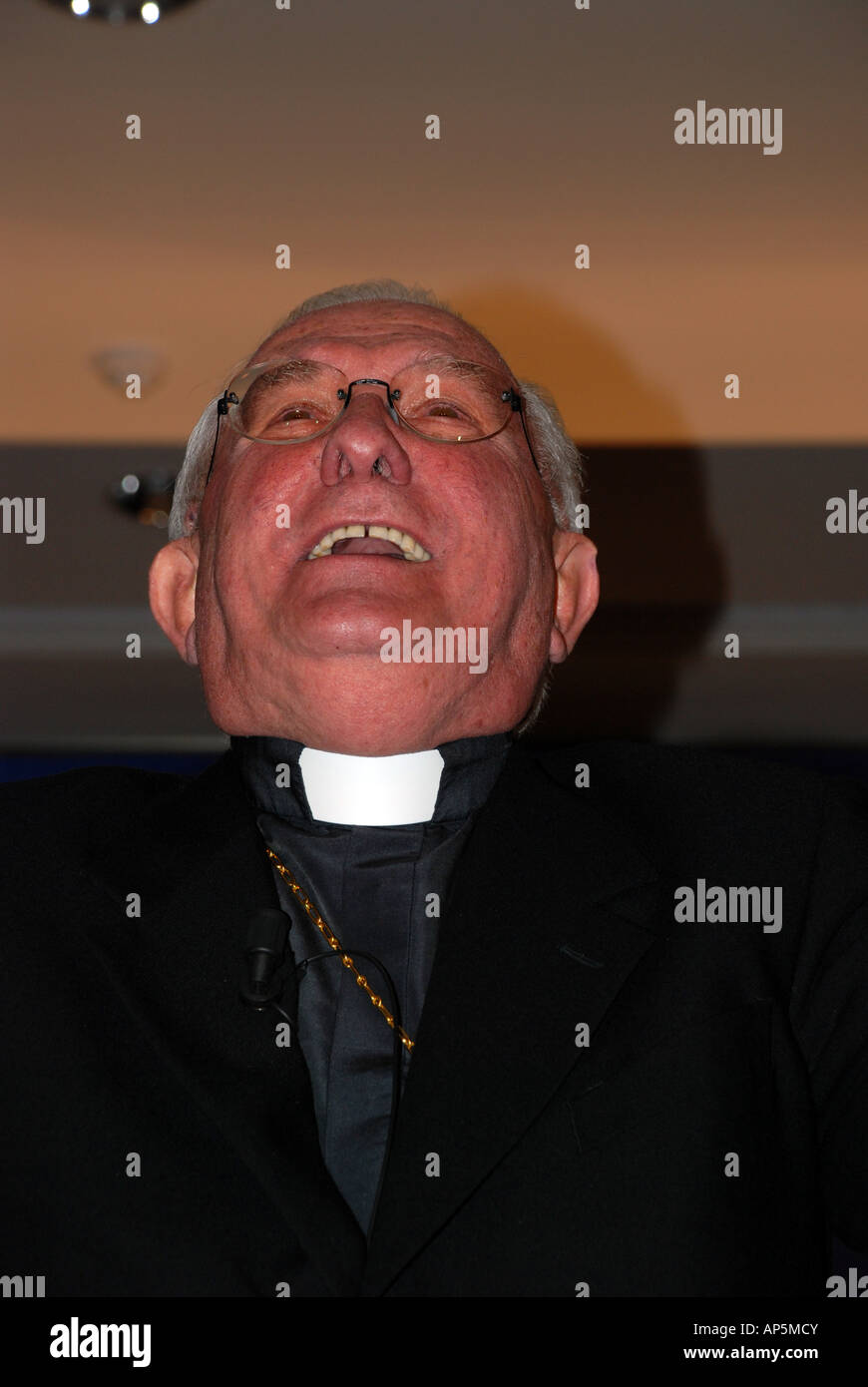 Priest speaking hi-res stock photography and images - Alamy