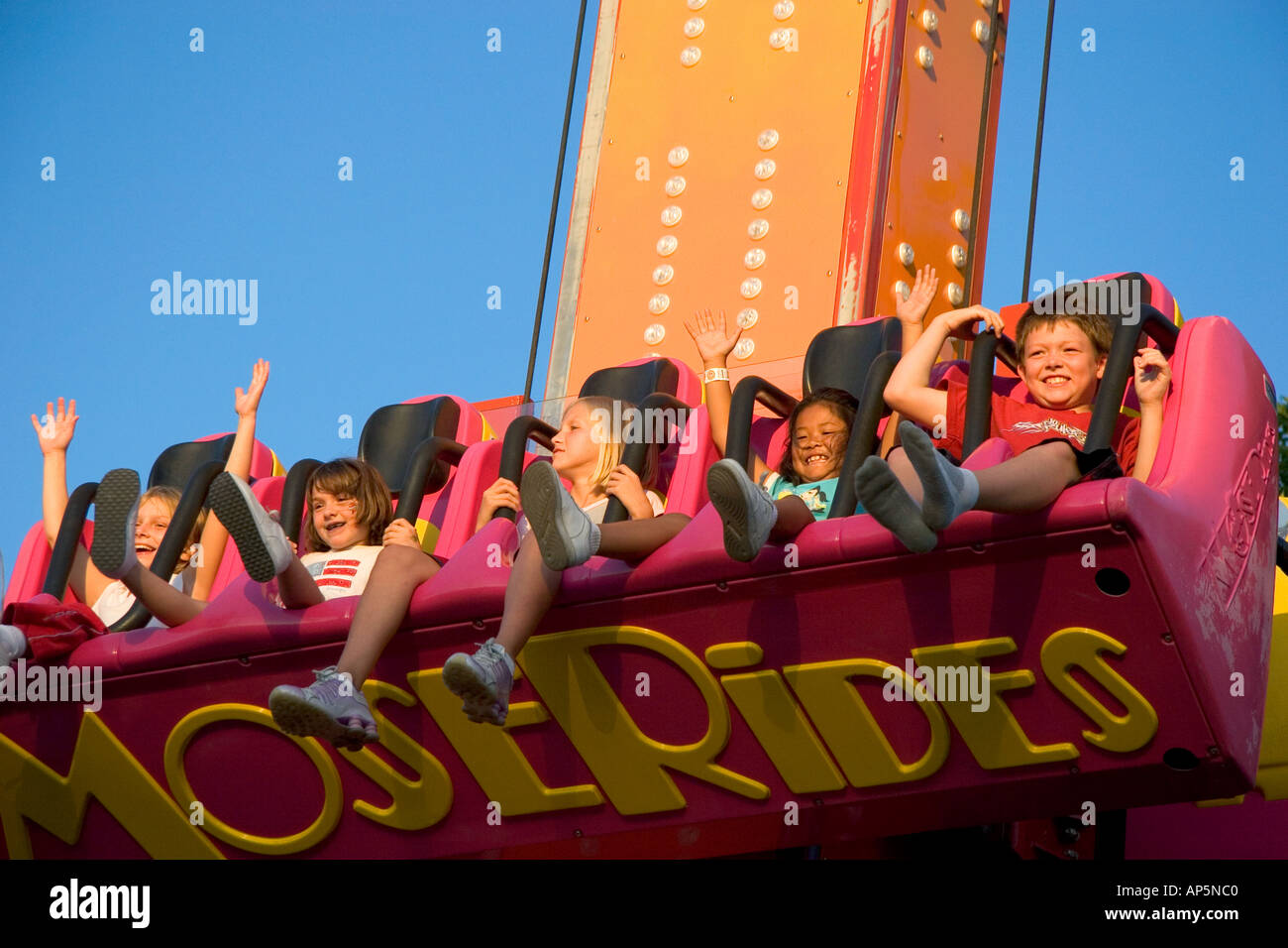 Children having fun on a ride at the Iowa state fair in Des Moines ...