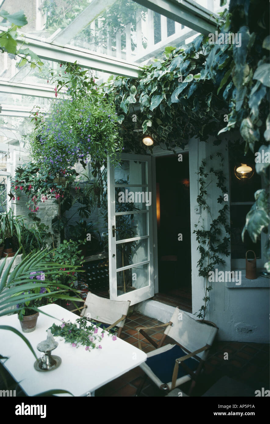 Conservatory with plants Stock Photo - Alamy