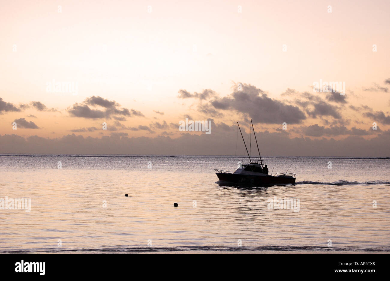 Boat in the fading light Stock Photo - Alamy