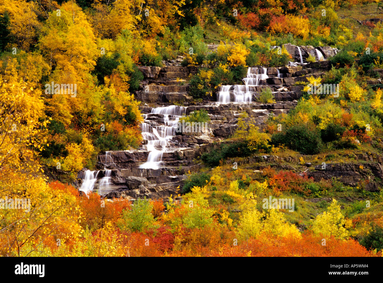 Waterfall below Mt Cannon in Glacier National Park in Montana Stock ...