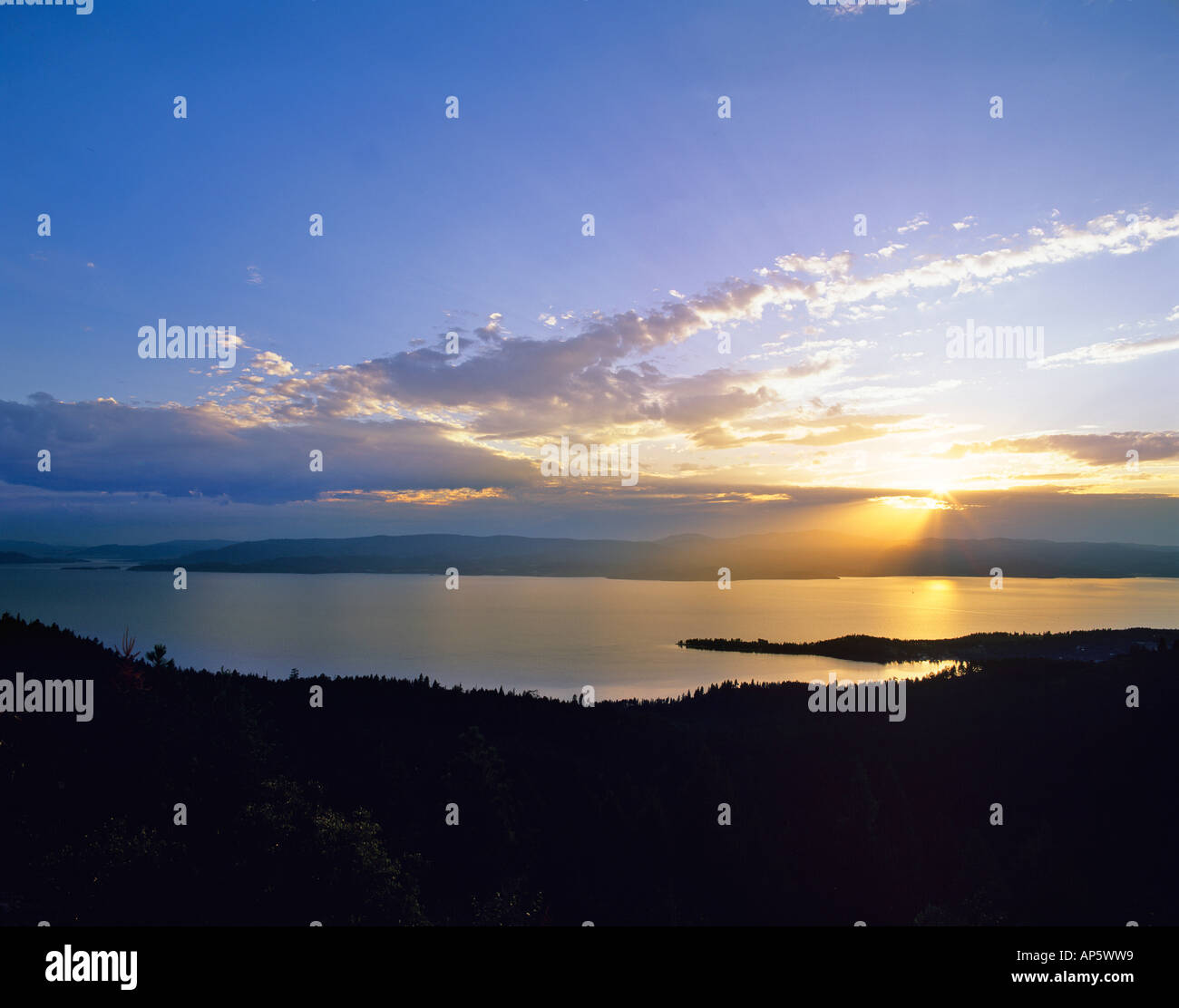 Sun sets over mountain lake hi-res stock photography and images - Alamy