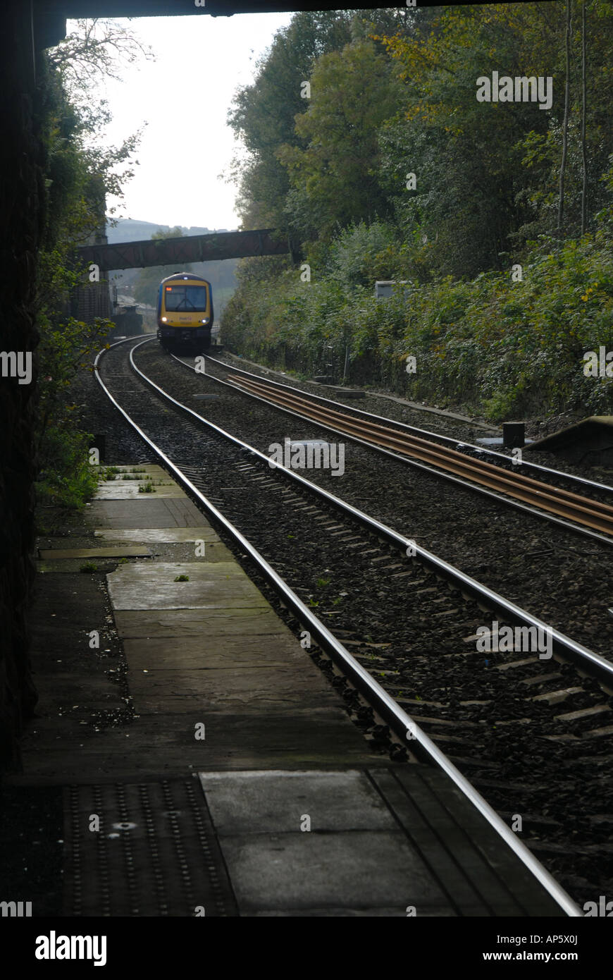 Train Ariving at Station Stock Photo - Alamy