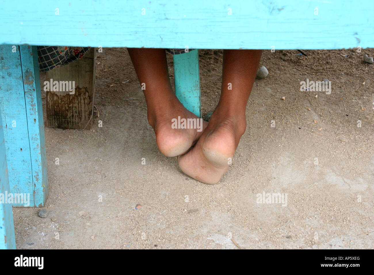 Barefoot student child attending at a rural school Stock Photo - Alamy