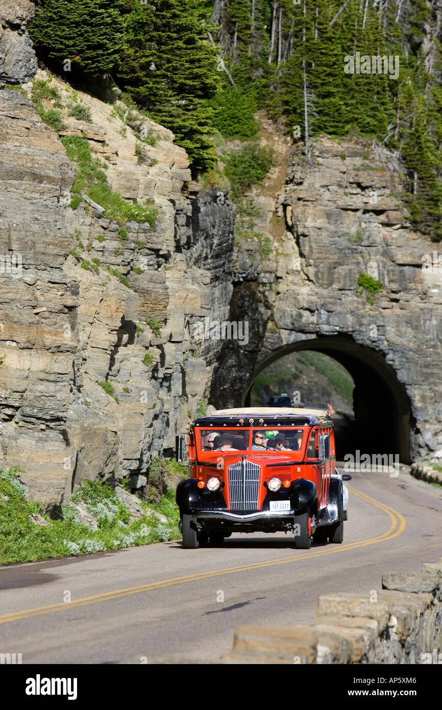 Red Jammer Bus through East side tunnel in Glacier National Park in ...