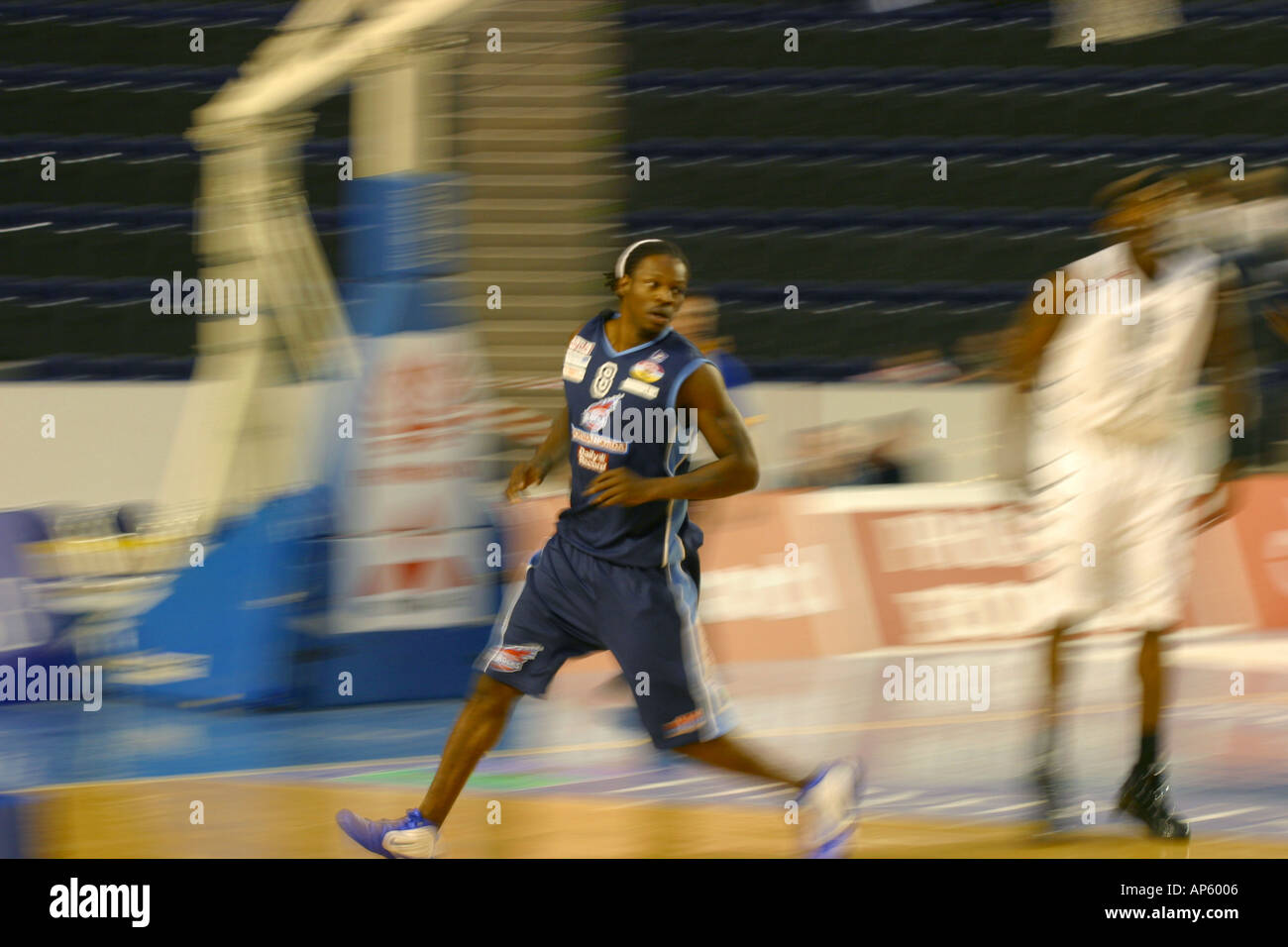 High speed basketball action Stock Photo - Alamy