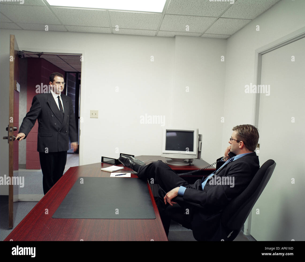 Man walking into office for an interview Stock Photo - Alamy