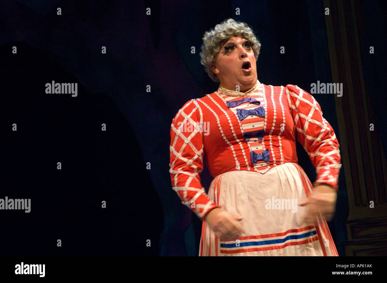 The panto dame on stage alone: Mother Goose amateur pantomime on stage ...