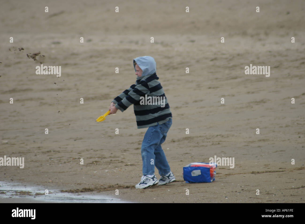 boy playing in sand Stock Photo - Alamy