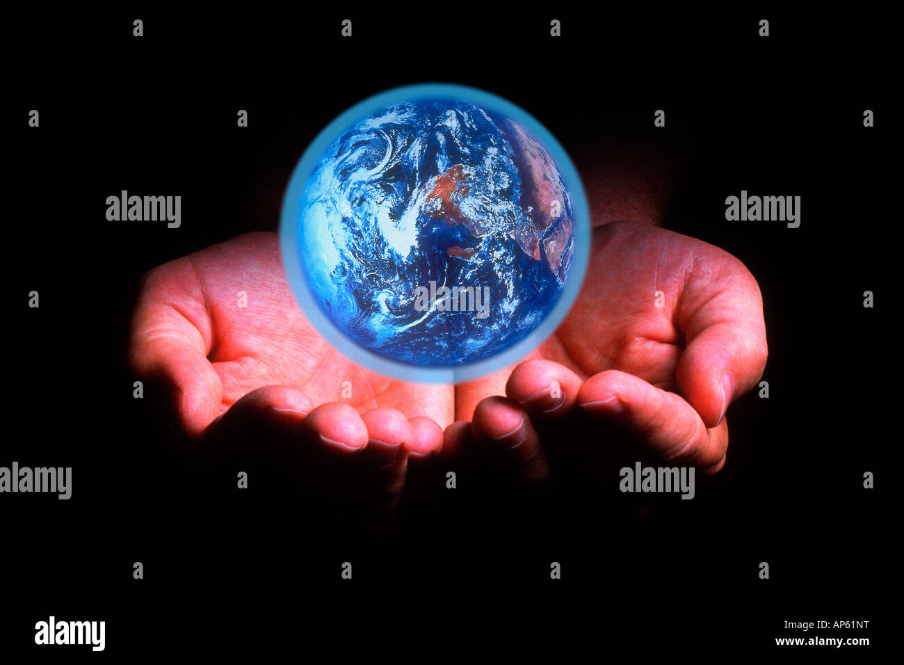 Human hand holding planet Earth, digital composite Stock Photo - Alamy