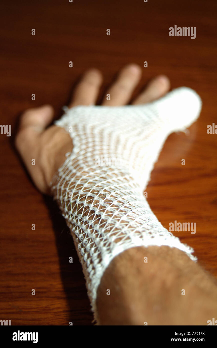 Wounded hand bandaged Stock Photo - Alamy