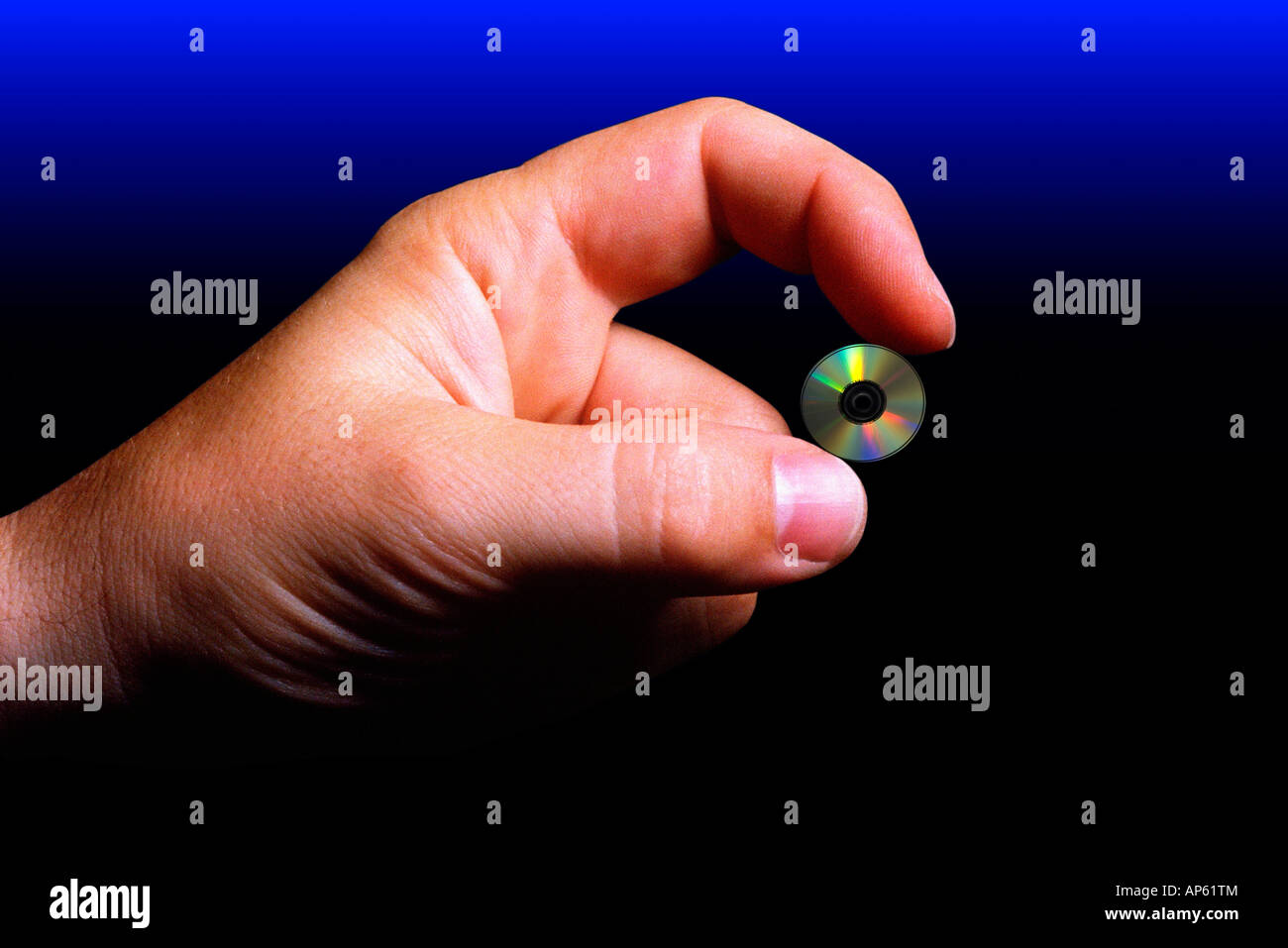 Human hand holding Compact disc, digital composite Stock Photo - Alamy