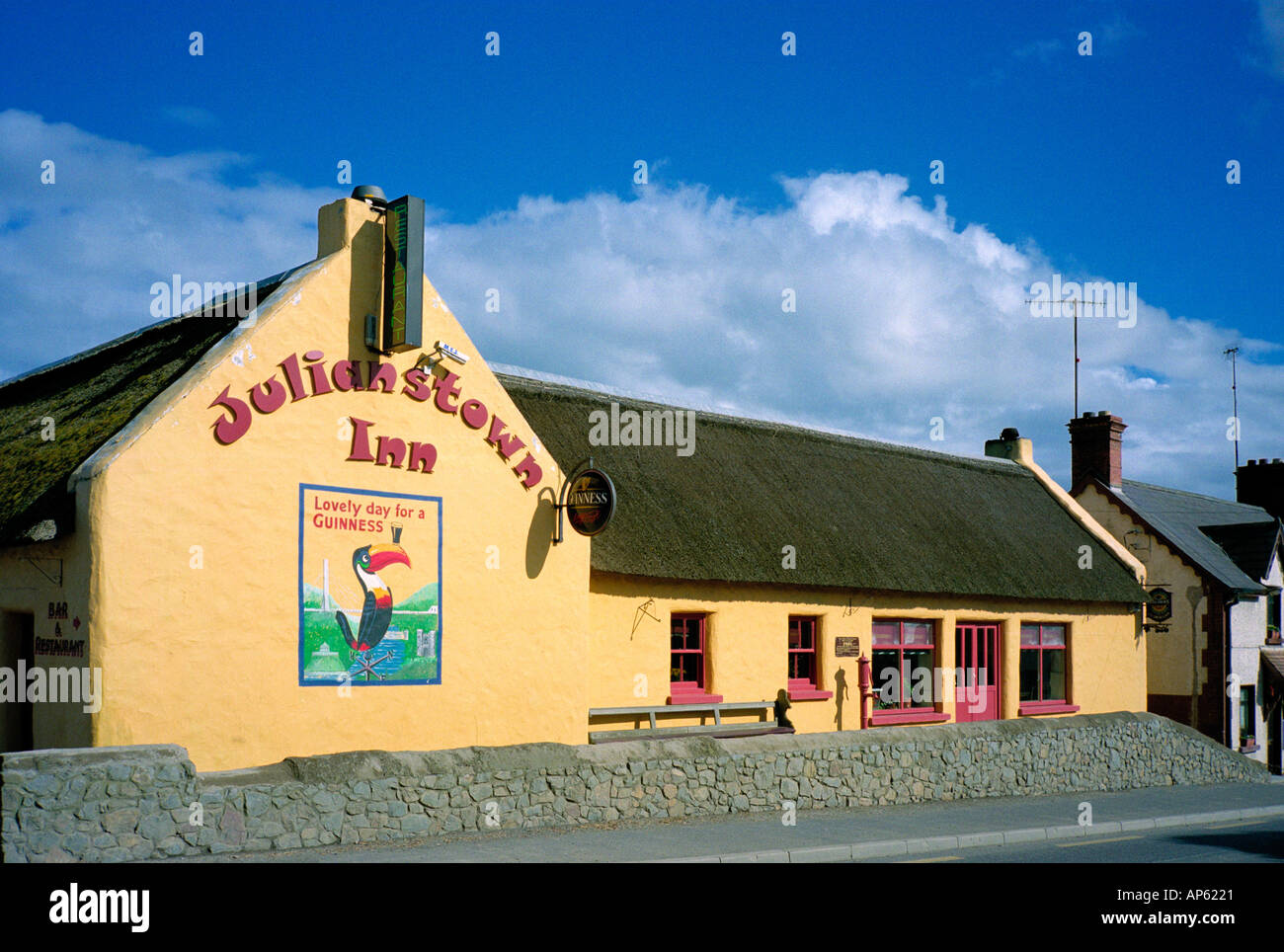 An Irish thatched cottage pub, the Julianstown Inn, near Drogheda ...