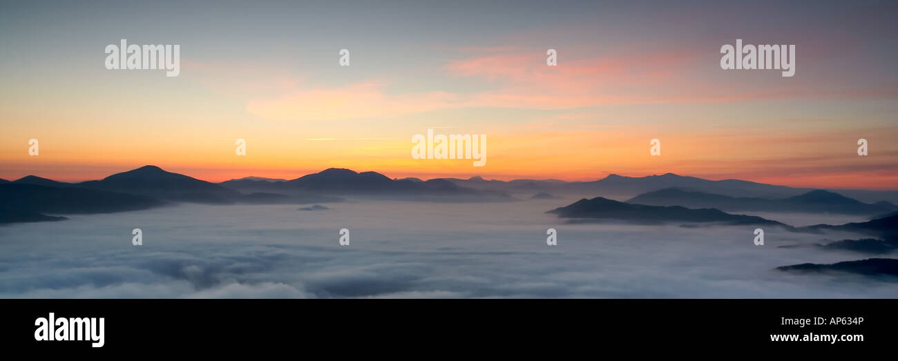 Sunrise over the fog Panoramic photo Stock Photo - Alamy