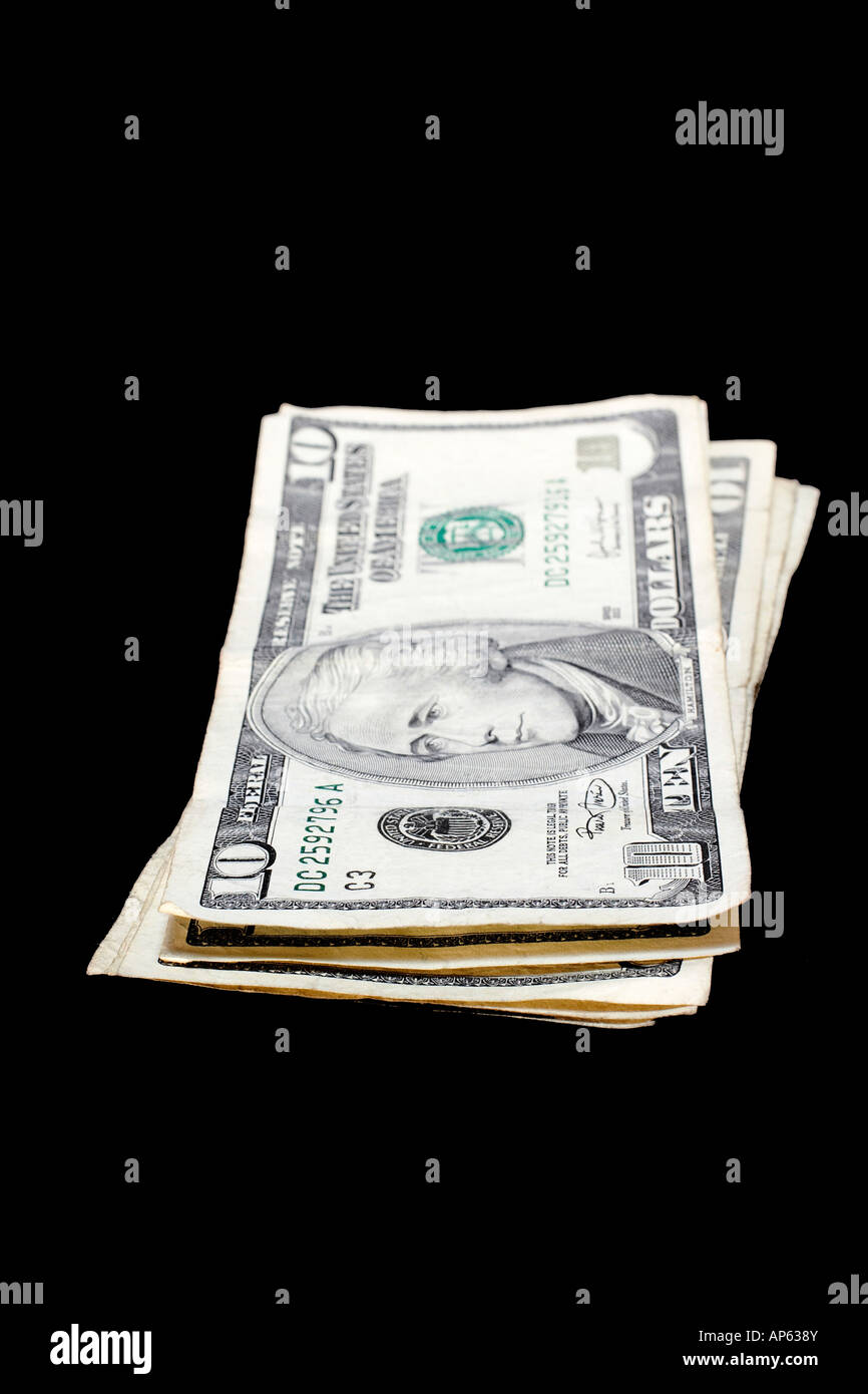 Stack of dollar bills isolated on black background Stock Photo - Alamy
