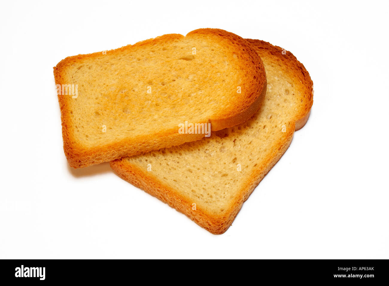 Two slices of toasted bread isolated on white background Stock Photo ...