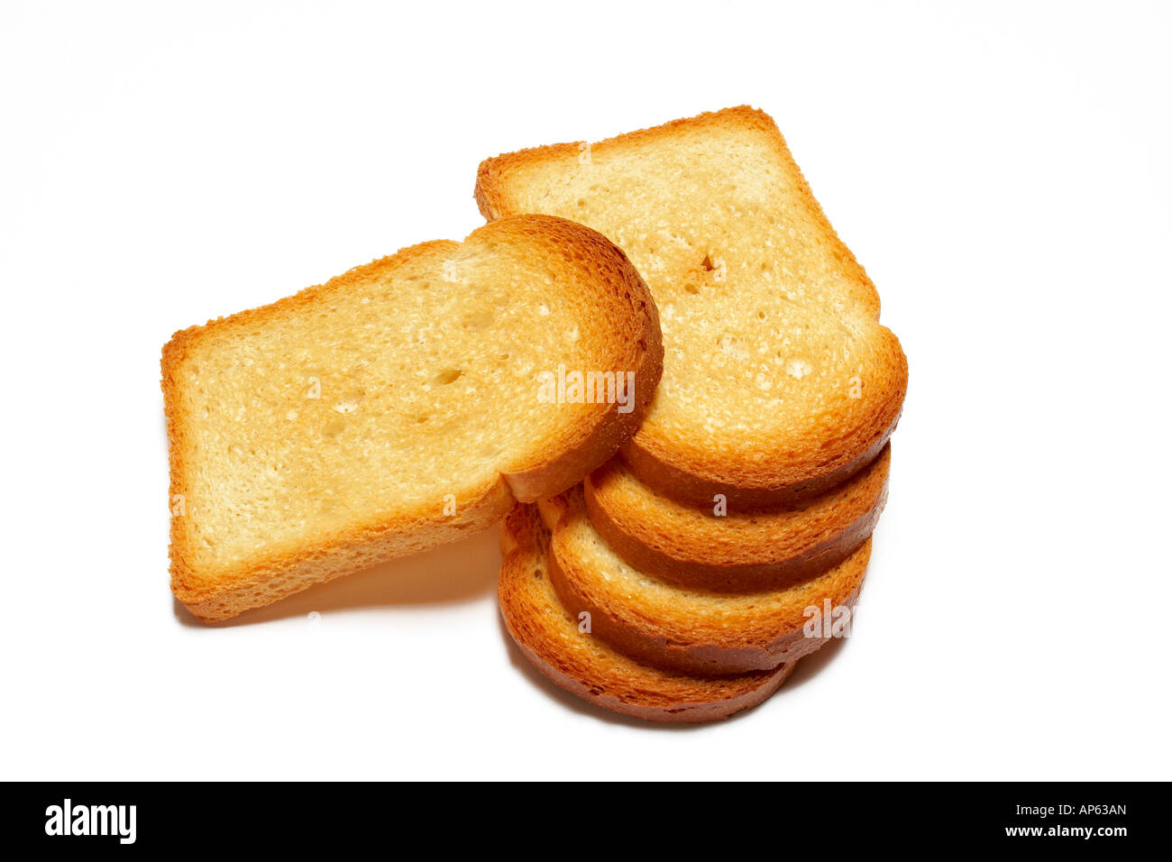 Some slices of toasted bread isolated on white background Stock Photo ...