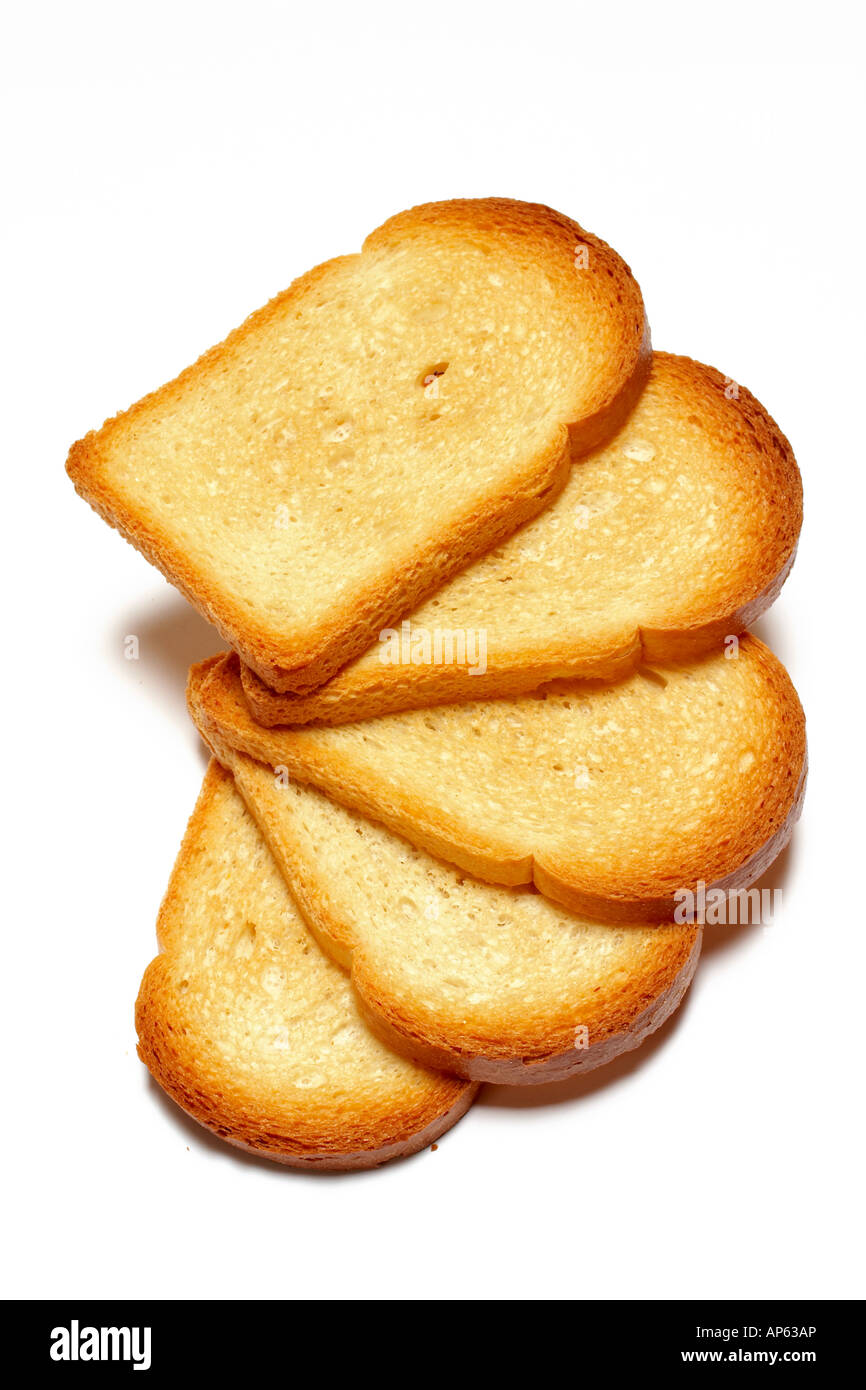 Some Slices of toasted bread isolated on white background Stock Photo ...