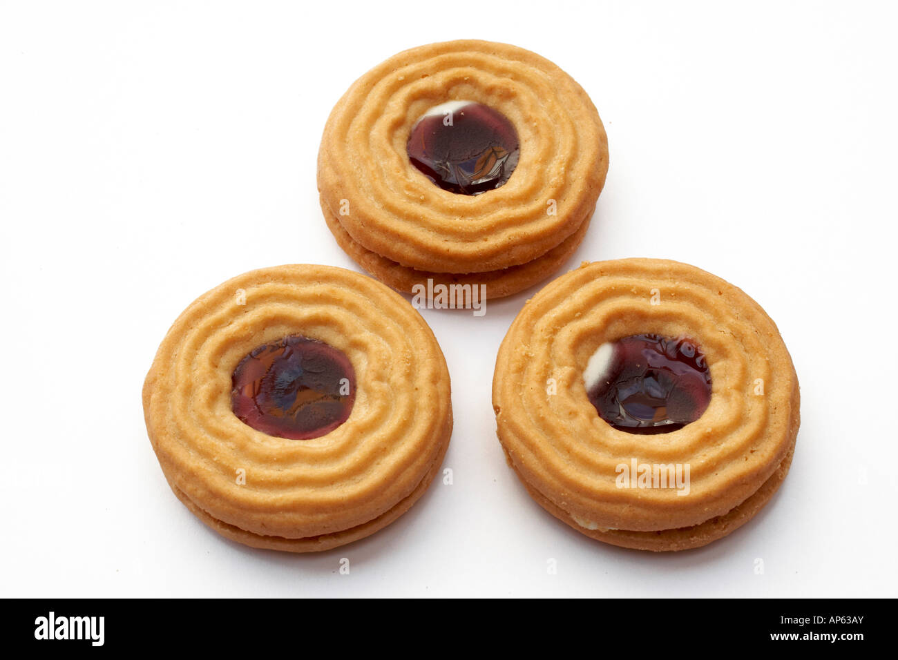 Three Strawberry cookies on white background Stock Photo - Alamy