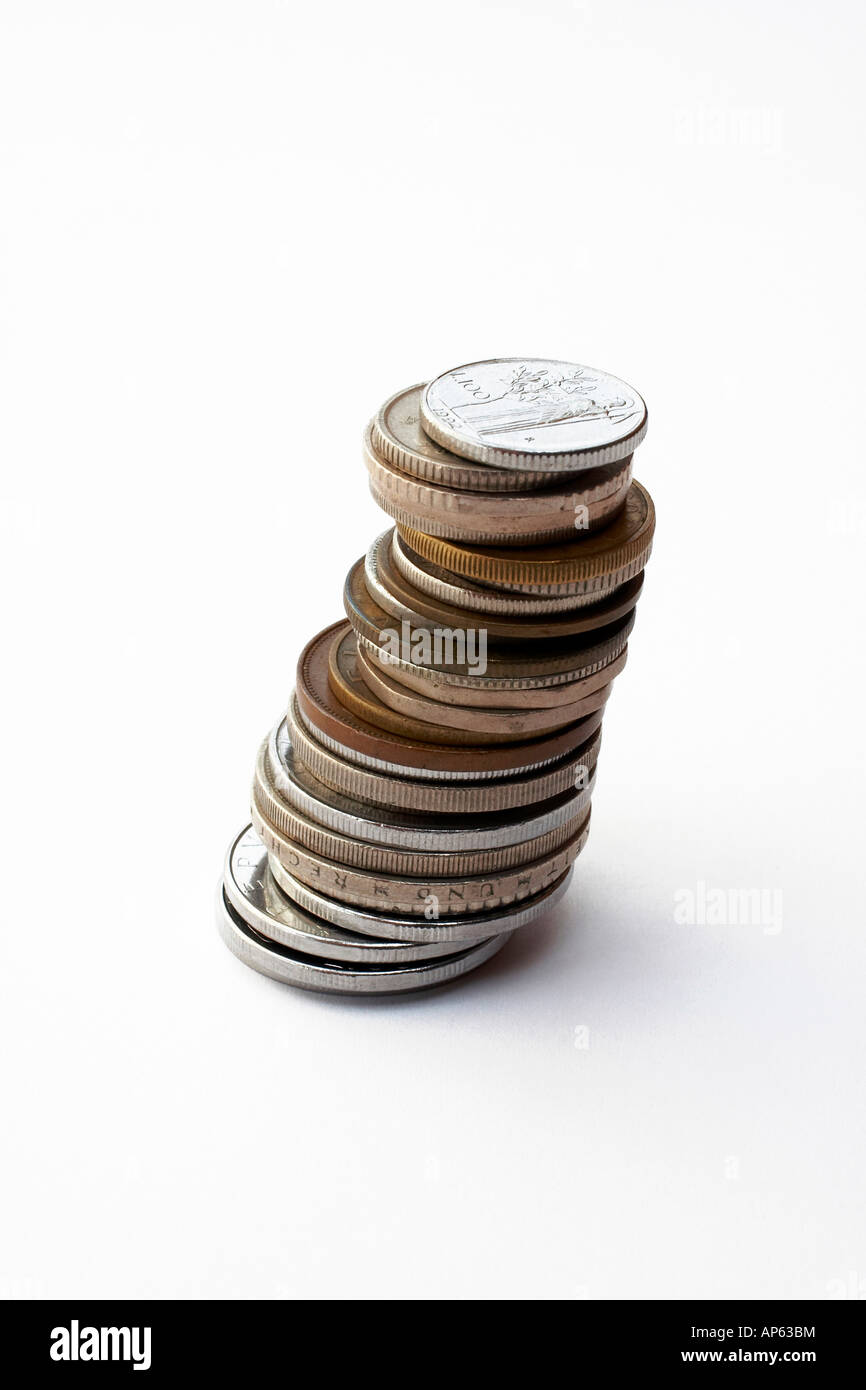Stack of coins isolated on white background Stock Photo - Alamy