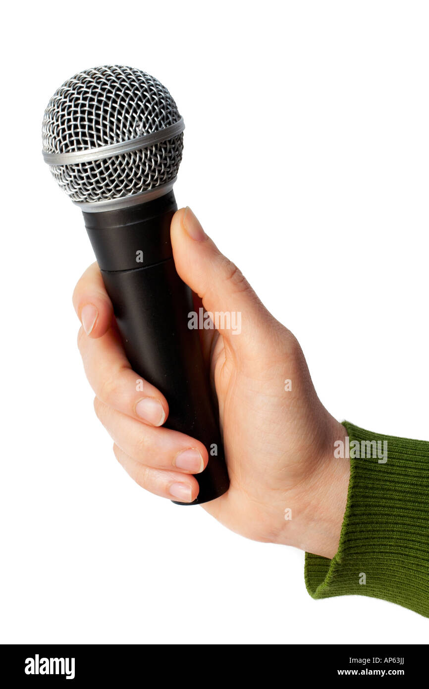 Holding a microphone Stock Photo - Alamy
