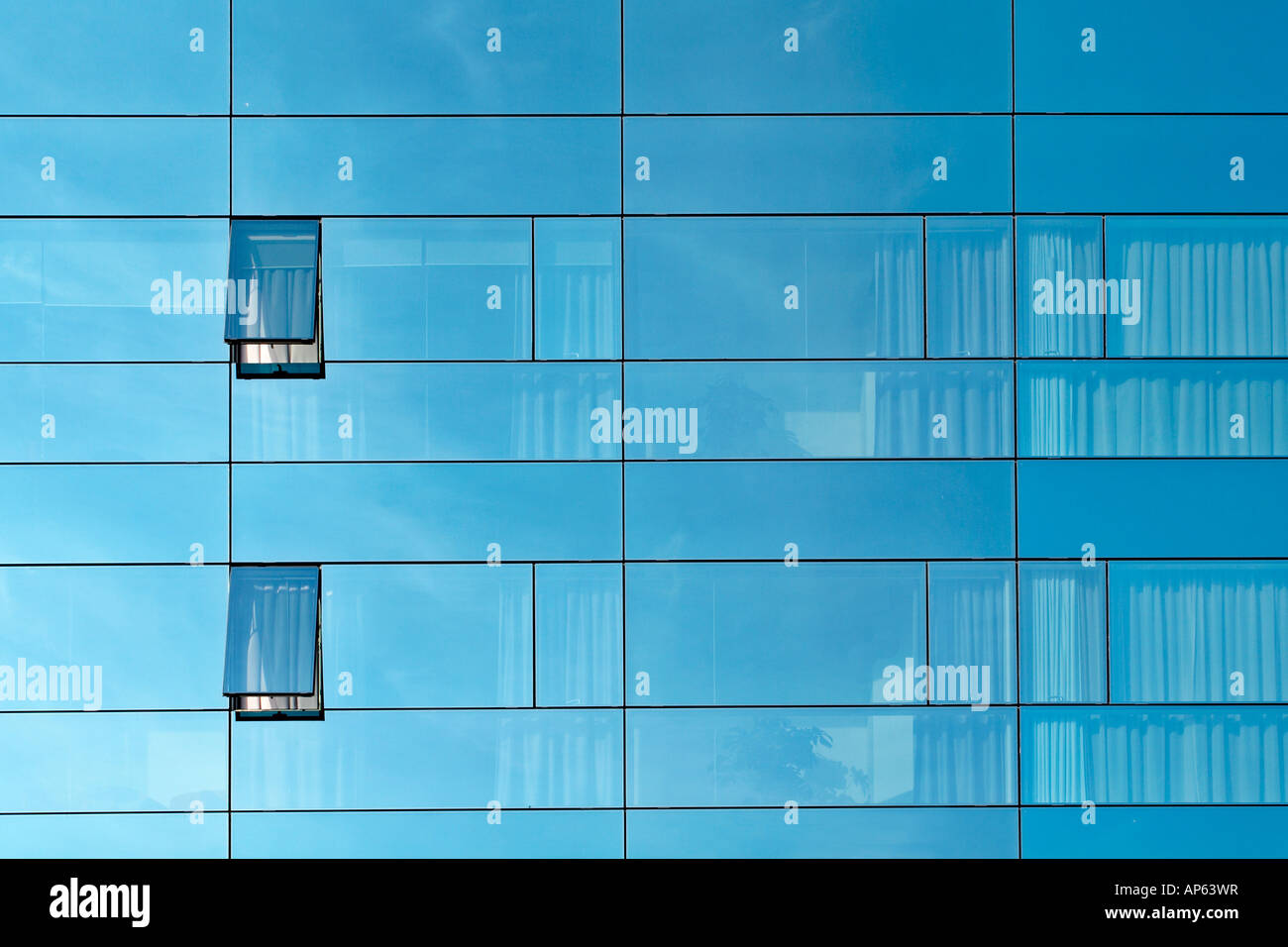 Reflection in an office building glass wall Background Stock Photo - Alamy