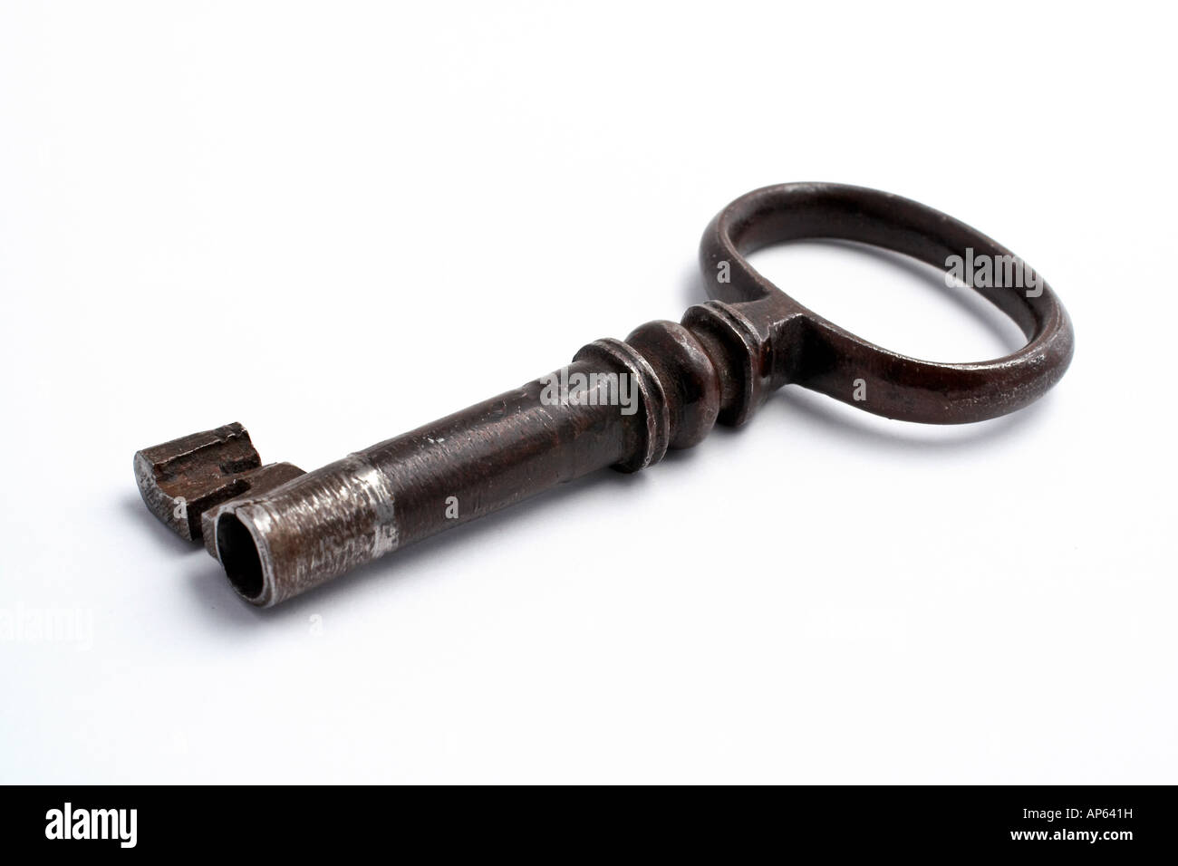 Old key on white background Macro Stock Photo - Alamy
