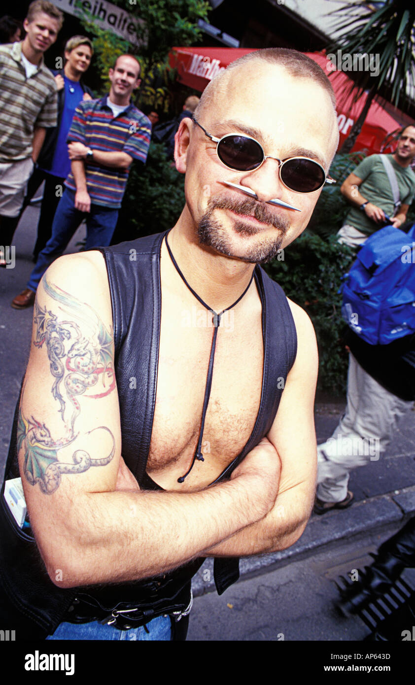 Christopher Street Day Man with nose piercing and tattoo Stock Photo ...
