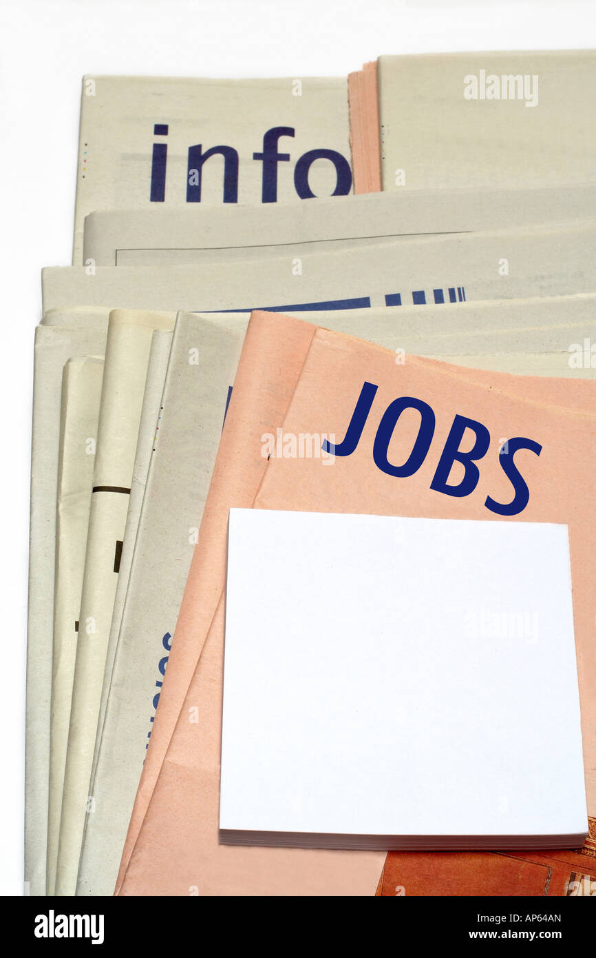Stacked jobs newspapers on white background Stock Photo - Alamy