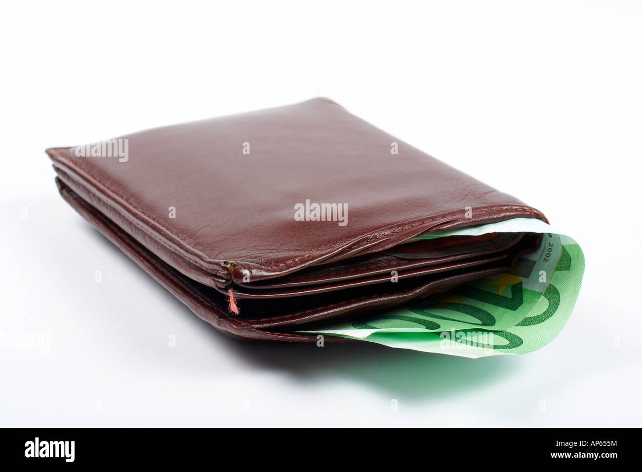 Old leather wallet with bills inside isolated on white background Stock ...